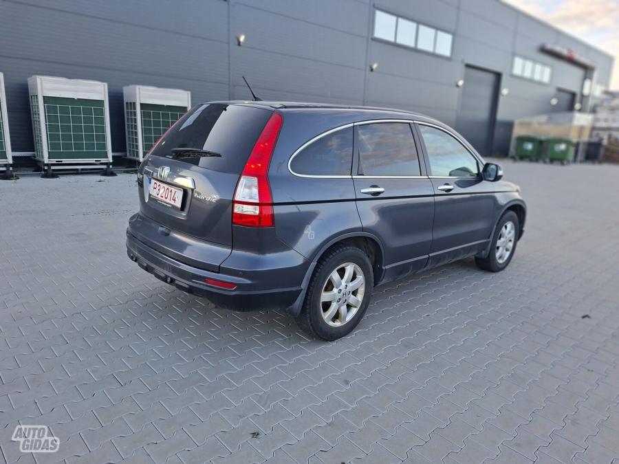 Blue Honda CR-V 2012 in Kaunas, with an engine capacity of 2.20 L and mileage of 290 thousand km for 5350 €, photo 16 on AUTOMOTO.COM.LV