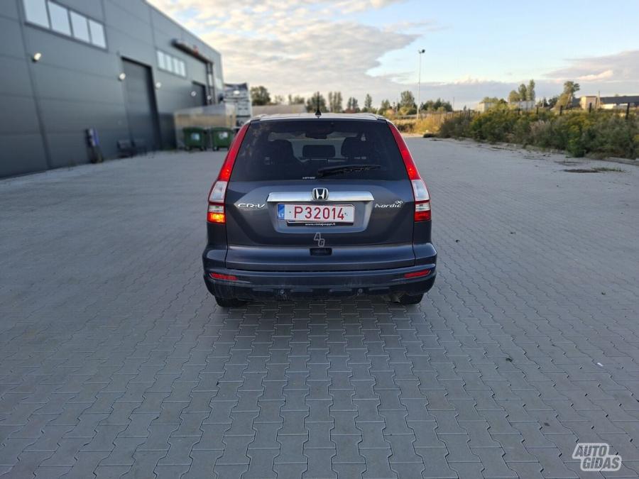 Blue Honda CR-V 2012 in Kaunas, with an engine capacity of 2.20 L and mileage of 290 thousand km for 5350 €, photo 18 on AUTOMOTO.COM.LV
