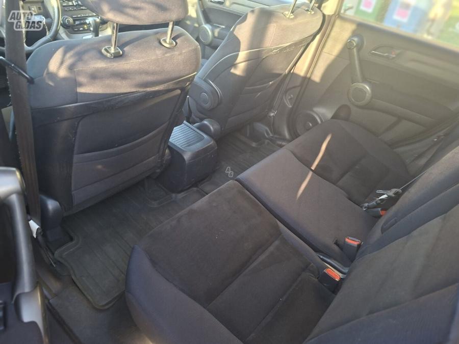 Blue Honda CR-V 2012 in Kaunas, with an engine capacity of 2.20 L and mileage of 290 thousand km for 5350 €, photo 27 on AUTOMOTO.COM.LV