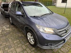 Blue Honda CR-V 2013 in Riga, with an engine capacity of 2.00 L and mileage of 187 thousand km for 11750 €, photo 9 on AUTOMOTO.COM.LV