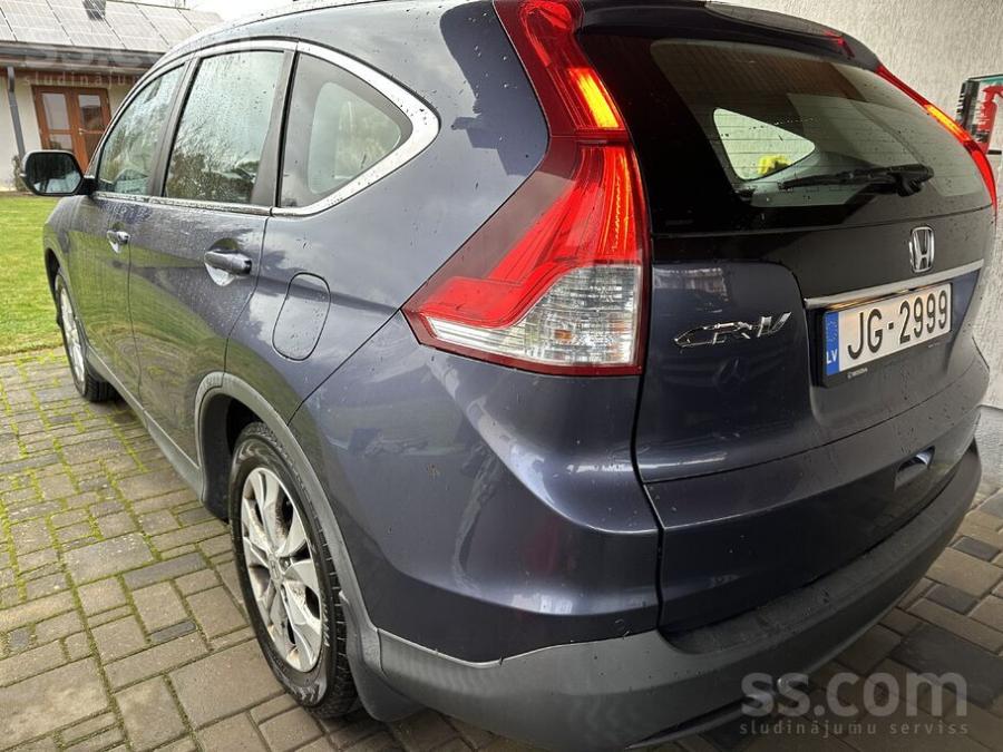 Blue Honda CR-V 2013 in Riga, with an engine capacity of 2.00 L and mileage of 187 thousand km for 11750 €, photo 12 on AUTOMOTO.COM.LV
