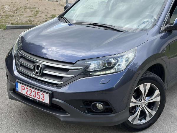 Blue Honda CR-V 2013 in Raseiniai, with an engine capacity of 1.60 L and mileage of 269 thousand km for 8999 €, photo 5 on AUTOMOTO.COM.LV