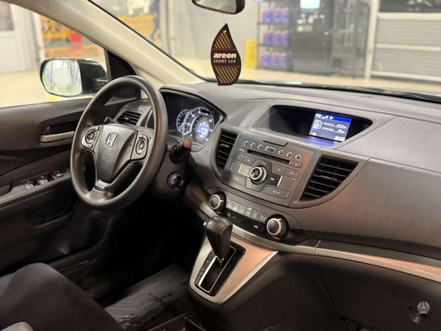 Blue Honda CR-V 2014 in Vilnius, with an engine capacity of 2.35 L and mileage of 97 thousand km for 7350 €, photo 12 on AUTOMOTO.COM.LV