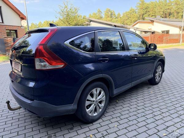 Blue Honda CR-V 2014 in Silale, with an engine capacity of 2.20 L and mileage of 313 thousand km for 6000 €, photo 6 on AUTOMOTO.COM.LV