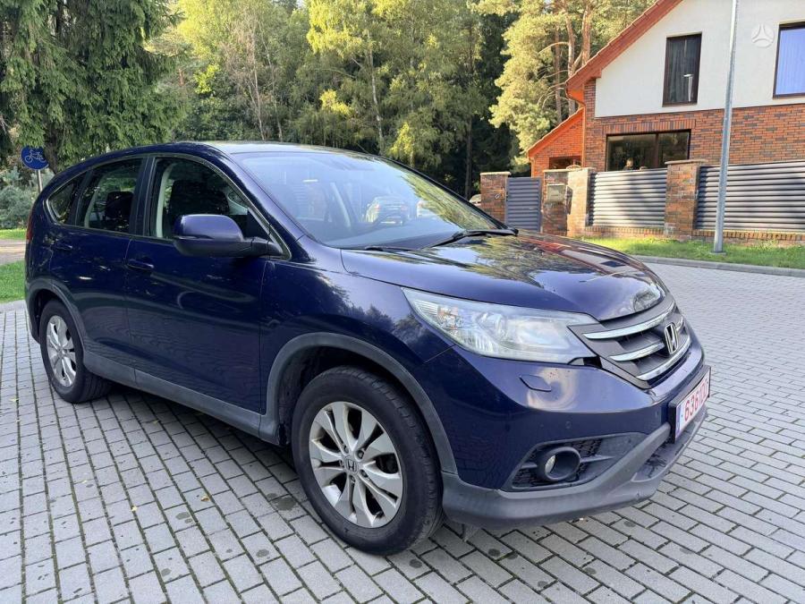 Blue Honda CR-V 2014 in Silale, with an engine capacity of 2.20 L and mileage of 313 thousand km for 6000 €, photo 7 on AUTOMOTO.COM.LV