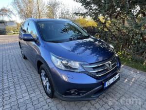 Zils Honda CR-V 2015 Rīga, ar dzinēja tilpumu 2.20 L un nobraukumu 176 tūkst. km par 11800 €, foto  vietnē AUTOMOTO.COM.LV