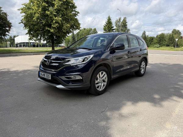 Blue Honda CR-V 2015 in Plunge, with an engine capacity of 1.60 L and mileage of 200 thousand km for 10759 €, photo 1 on AUTOMOTO.COM.LV
