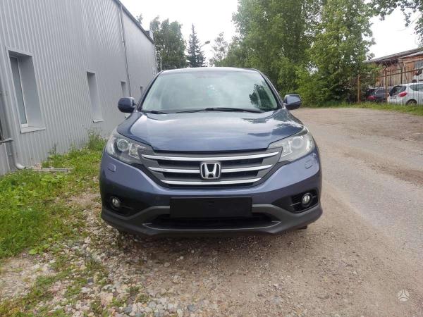 Blue Honda CR-V 2015 in Ukmerge, with an engine capacity of 1.60 L and mileage of 209 thousand km for 8650 €, photo 1 on AUTOMOTO.COM.LV