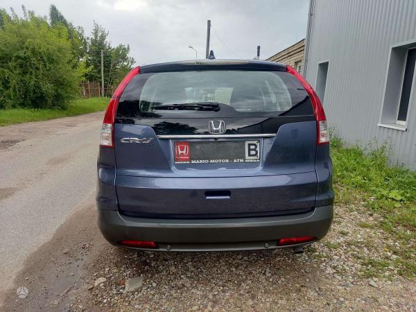 Blue Honda CR-V 2015 in Ukmerge, with an engine capacity of 1.60 L and mileage of 209 thousand km for 8650 €, photo 5 on AUTOMOTO.COM.LV