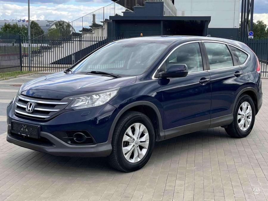 Blue Honda CR-V 2015 in Jonava, with an engine capacity of 2.20 L and mileage of 353 thousand km for 8200 €, photo 4 on AUTOMOTO.COM.LV