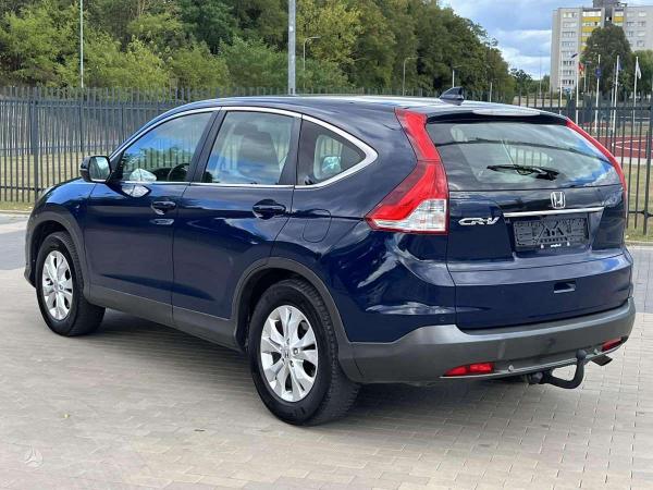 Blue Honda CR-V 2015 in Jonava, with an engine capacity of 2.20 L and mileage of 353 thousand km for 8200 €, photo 6 on AUTOMOTO.COM.LV