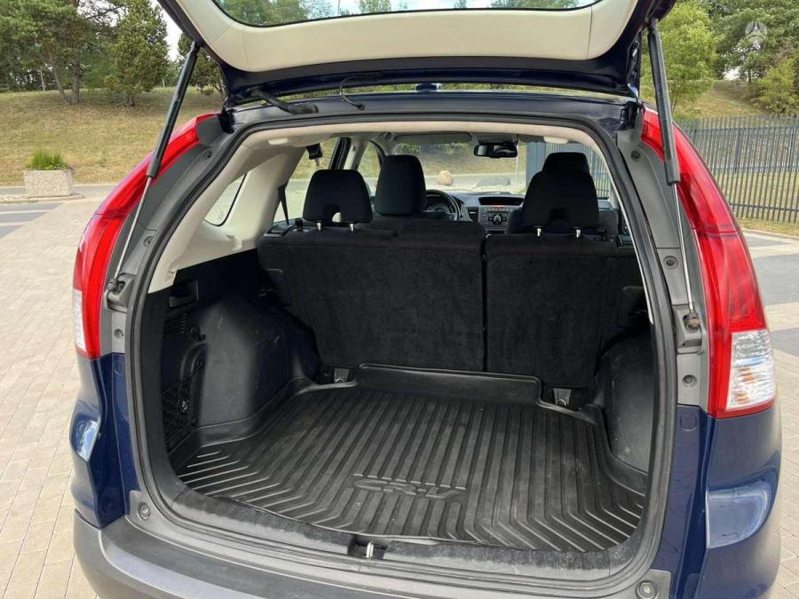 Blue Honda CR-V 2015 in Jonava, with an engine capacity of 2.20 L and mileage of 353 thousand km for 8200 €, photo 9 on AUTOMOTO.COM.LV