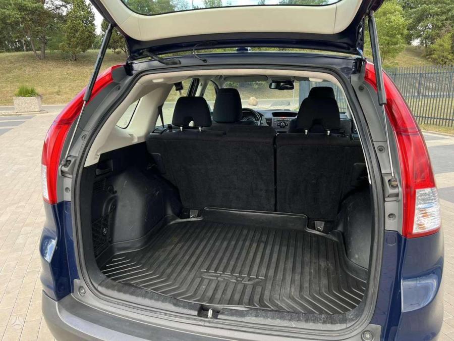 Zils Honda CR-V 2015 Jonava, ar dzinēja tilpumu 2.20 L un nobraukumu 354 tūkst. km par 8200 €, foto 18 vietnē AUTOMOTO.COM.LV