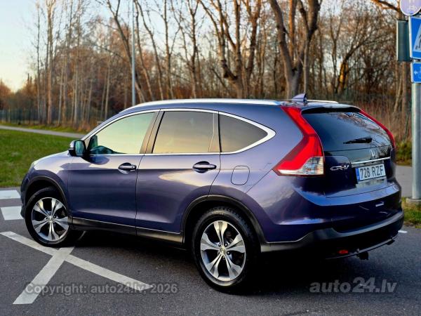 Blue Honda CR-V 2014 in Tallinn, with an engine capacity of 2.20 L and mileage of 249 thousand km for 8990 €, photo 4 on AUTOMOTO.COM.LV