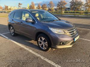 Blue Honda CR-V 2015 in Tallinn, with an engine capacity of 2.20 L and mileage of 244 thousand km for 10500 €, photo 3 on AUTOMOTO.COM.LV