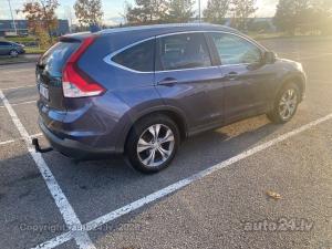 Blue Honda CR-V 2015 in Tallinn, with an engine capacity of 2.20 L and mileage of 244 thousand km for 10500 €, photo 5 on AUTOMOTO.COM.LV