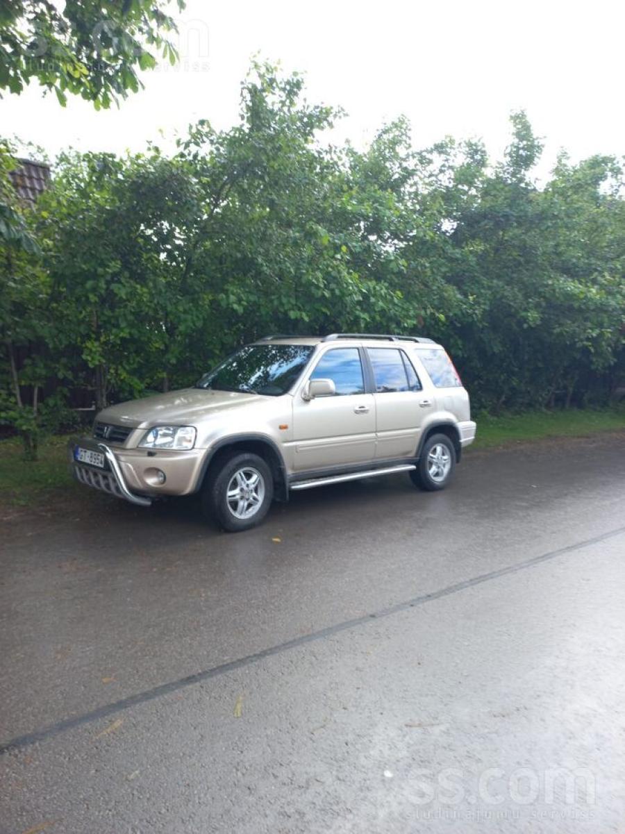 Brown Honda CR-V 2001 in Riga, with an engine capacity of 2.00 L and mileage of 270 thousand km for 1700 €, photo 4 on AUTOMOTO.COM.LV