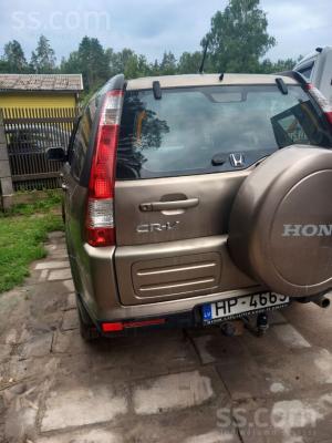 Brown Honda CR-V 2002 in Riga, with an engine capacity of 2.00 L and mileage of 304 thousand km for 1100 €, photo  on AUTOMOTO.COM.LV