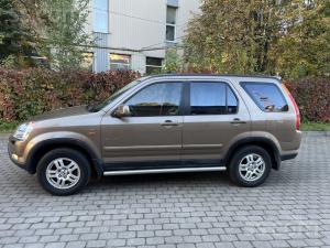 Brown Honda CR-V 2002 in Riga, with an engine capacity of 2.00 L and mileage of 190 thousand km for 2900 €, photo  on AUTOMOTO.COM.LV