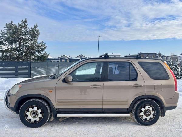 Brown Honda CR-V 2003 in Vilnius, with an engine capacity of 2.00 L and mileage of 350 thousand km for 2400 €, photo 2 on AUTOMOTO.COM.LV