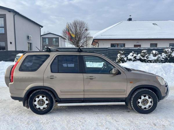 Brown Honda CR-V 2003 in Vilnius, with an engine capacity of 2.00 L and mileage of 350 thousand km for 2400 €, photo 6 on AUTOMOTO.COM.LV