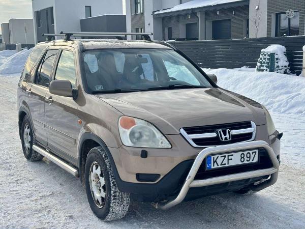 Brown Honda CR-V 2003 in Vilnius, with an engine capacity of 2.00 L and mileage of 350 thousand km for 2400 €, photo 7 on AUTOMOTO.COM.LV