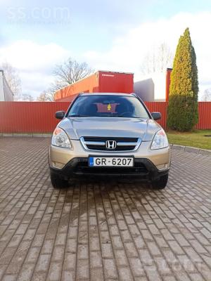 Brown Honda CR-V 2004 in Gulbene, with an engine capacity of 2.00 L and mileage of 256 thousand km for 1450 €, photo 2 on AUTOMOTO.COM.LV