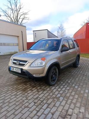 Brown Honda CR-V 2004 in Gulbene, with an engine capacity of 2.00 L and mileage of 256 thousand km for 1450 €, photo 3 on AUTOMOTO.COM.LV