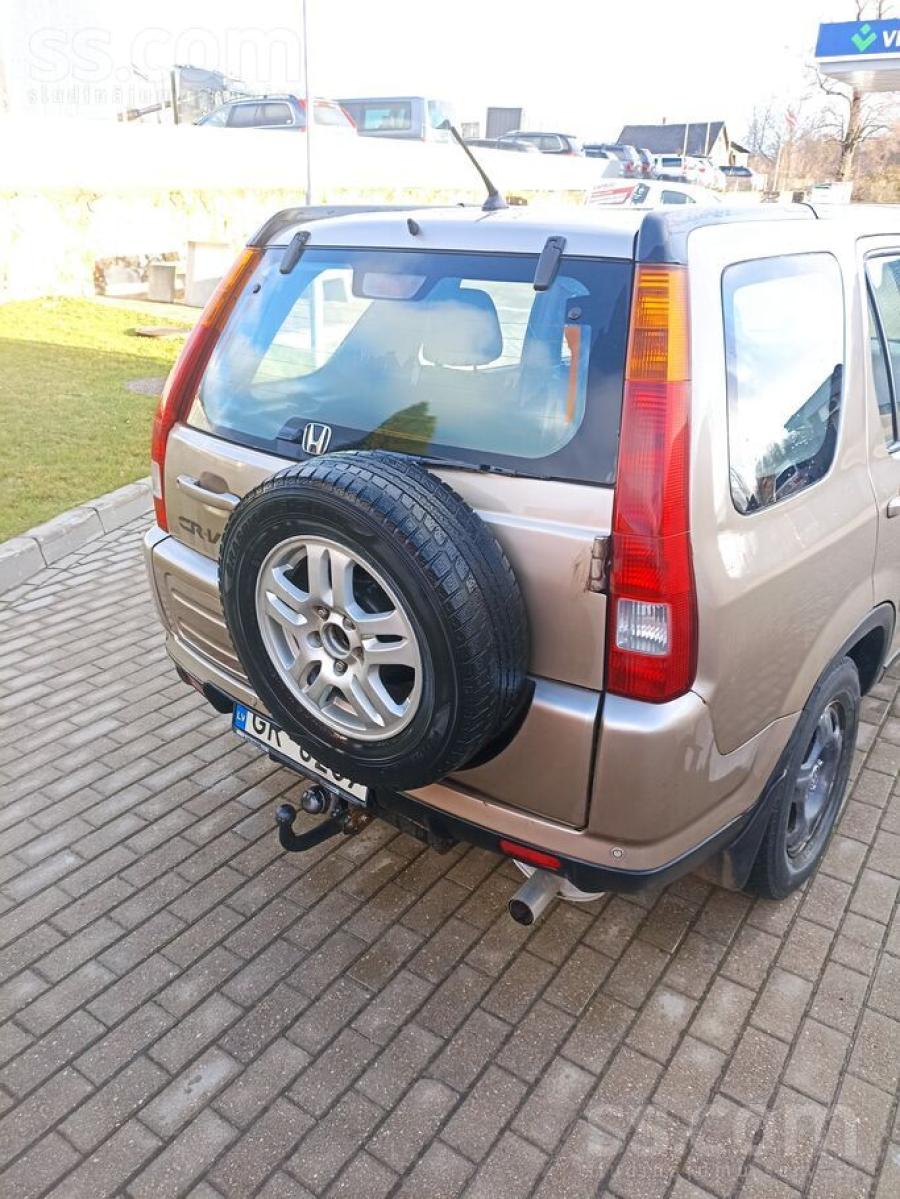 Brown Honda CR-V 2004 in Gulbene, with an engine capacity of 2.00 L and mileage of 256 thousand km for 1450 €, photo 4 on AUTOMOTO.COM.LV