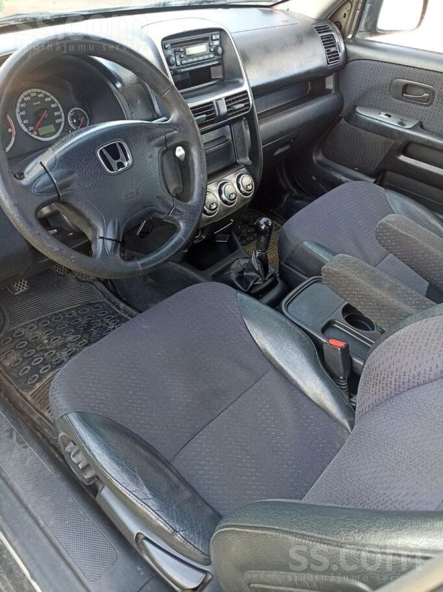 Brown Honda CR-V 2004 in Gulbene, with an engine capacity of 2.00 L and mileage of 256 thousand km for 1450 €, photo 7 on AUTOMOTO.COM.LV