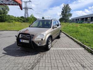 Brown Honda CR-V 2005 in Riga, with an engine capacity of 2.00 L and mileage of 258 thousand km for 2900 €, photo  on AUTOMOTO.COM.LV