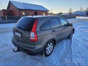 Brown Honda CR-V 2006 in Riga, with an engine capacity of 2.00 L and mileage of 329 thousand km for 4200 €, photo 4 on AUTOMOTO.COM.LV