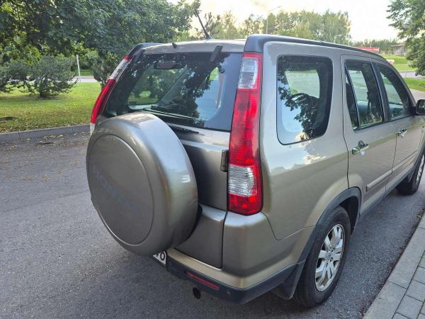 Brown Honda CR-V 2006 in Marijampole, with an engine capacity of 2.00 L and mileage of 230 thousand km for 3490 €, photo 3 on AUTOMOTO.COM.LV