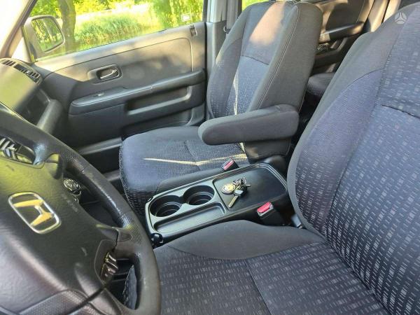Brown Honda CR-V 2006 in Marijampole, with an engine capacity of 2.00 L and mileage of 230 thousand km for 3490 €, photo 6 on AUTOMOTO.COM.LV