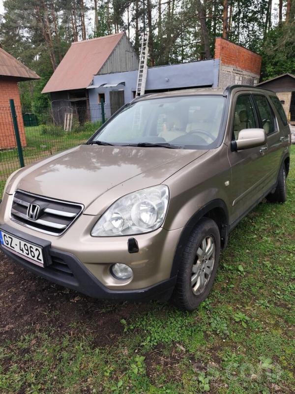 Brown Honda CR-V 2006 in Riga, with an engine capacity of 2.00 L and mileage of 200 thousand km for 500 €, photo 6 on AUTOMOTO.COM.LV