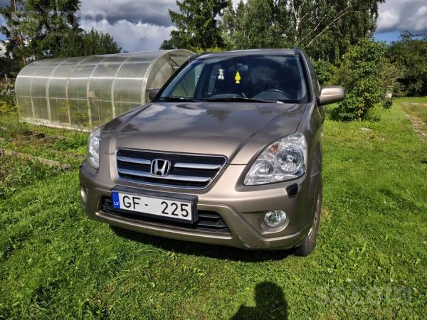 Brūns Honda CR-V 2006 Valmiera, ar dzinēja tilpumu 2.00 L un nobraukumu 340 tūkst. km par 650 €, foto 5 vietnē AUTOMOTO.COM.LV