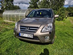 Brown Honda CR-V 2006 in Valmiera, with an engine capacity of 2.00 L and mileage of 340 thousand km for 650 €, photo 6 on AUTOMOTO.COM.LV