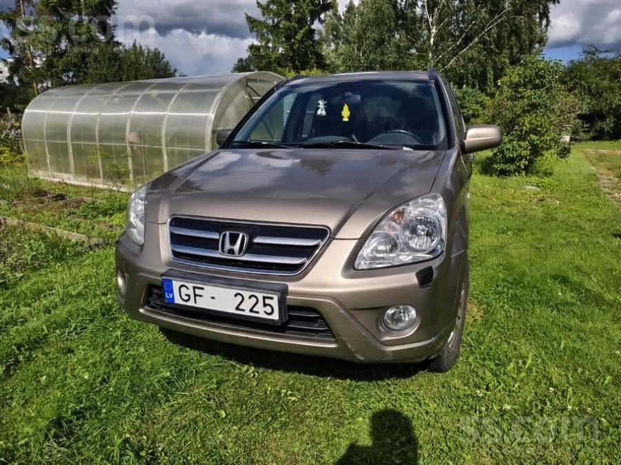 Brown Honda CR-V 2006 in Valmiera, with an engine capacity of 2.00 L and mileage of 340 thousand km for 650 €, photo 6 on AUTOMOTO.COM.LV