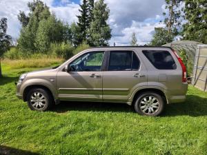 Brown Honda CR-V 2006 in Valmiera, with an engine capacity of 2.00 L and mileage of 340 thousand km for 650 €, photo 7 on AUTOMOTO.COM.LV