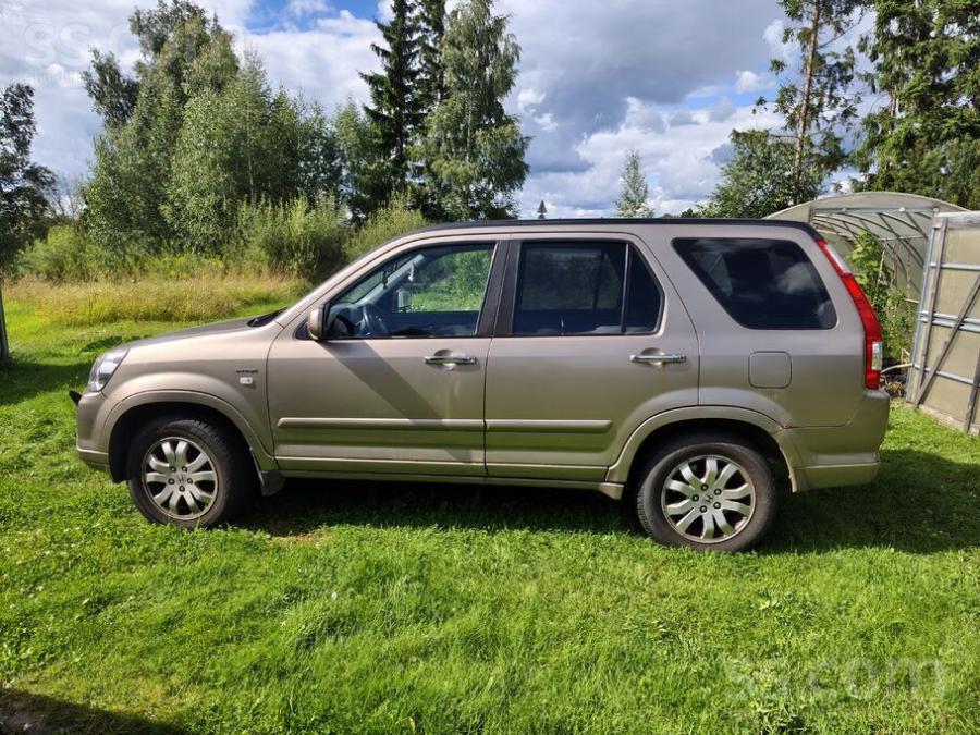 Brown Honda CR-V 2006 in Valmiera, with an engine capacity of 2.00 L and mileage of 340 thousand km for 650 €, photo 7 on AUTOMOTO.COM.LV