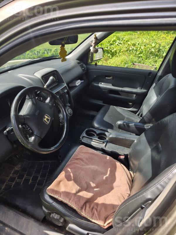 Brūns Honda CR-V 2006 Valmiera, ar dzinēja tilpumu 2.00 L un nobraukumu 340 tūkst. km par 650 €, foto 8 vietnē AUTOMOTO.COM.LV