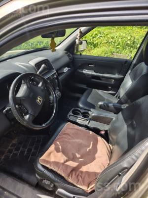 Brown Honda CR-V 2006 in Valmiera, with an engine capacity of 2.00 L and mileage of 340 thousand km for 650 €, photo 9 on AUTOMOTO.COM.LV
