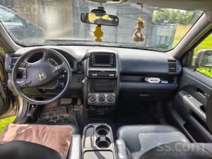 Brown Honda CR-V 2006 in Valmiera, with an engine capacity of 2.00 L and mileage of 340 thousand km for 650 €, photo 10 on AUTOMOTO.COM.LV