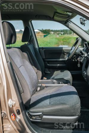 Brown Honda CR-V 2006 in Riga, with an engine capacity of 2.00 L and mileage of 203 thousand km for 4200 €, photo 18 on AUTOMOTO.COM.LV