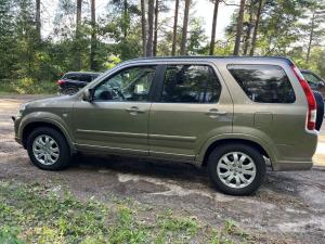 Brown Honda CR-V 2006 in Valmiera, with an engine capacity of 2.00 L and mileage of 340 thousand km for 2350 €, photo 3 on AUTOMOTO.COM.LV