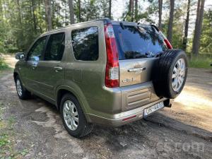 Brown Honda CR-V 2006 in Valmiera, with an engine capacity of 2.00 L and mileage of 340 thousand km for 2350 €, photo 4 on AUTOMOTO.COM.LV