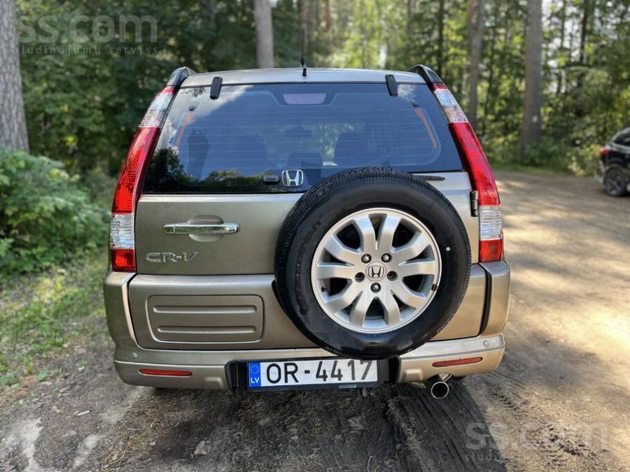 Brown Honda CR-V 2006 in Valmiera, with an engine capacity of 2.00 L and mileage of 340 thousand km for 2350 €, photo 5 on AUTOMOTO.COM.LV