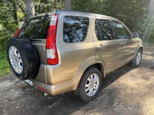 Brown Honda CR-V 2006 in Valmiera, with an engine capacity of 2.00 L and mileage of 340 thousand km for 2350 €, photo 6 on AUTOMOTO.COM.LV