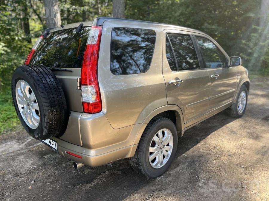 Brown Honda CR-V 2006 in Valmiera, with an engine capacity of 2.00 L and mileage of 340 thousand km for 2350 €, photo 6 on AUTOMOTO.COM.LV
