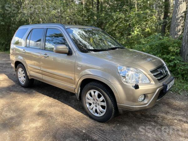 Brown Honda CR-V 2006 in Valmiera, with an engine capacity of 2.00 L and mileage of 340 thousand km for 2350 €, photo 7 on AUTOMOTO.COM.LV